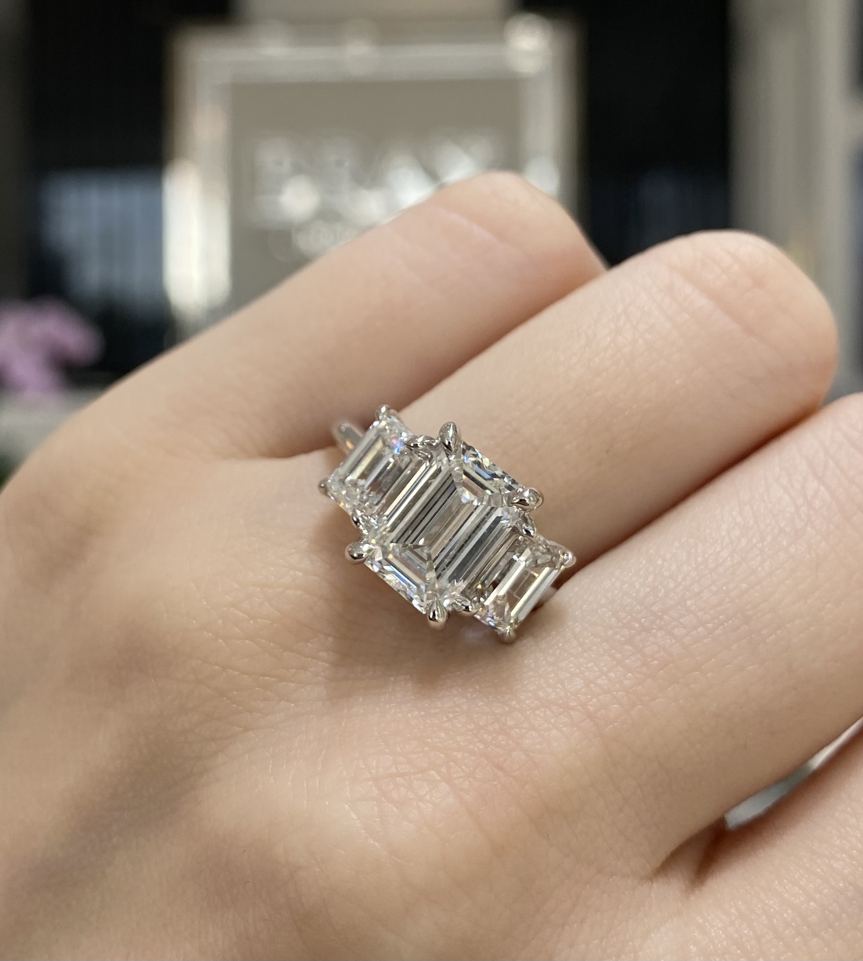 three emerald diamond ring