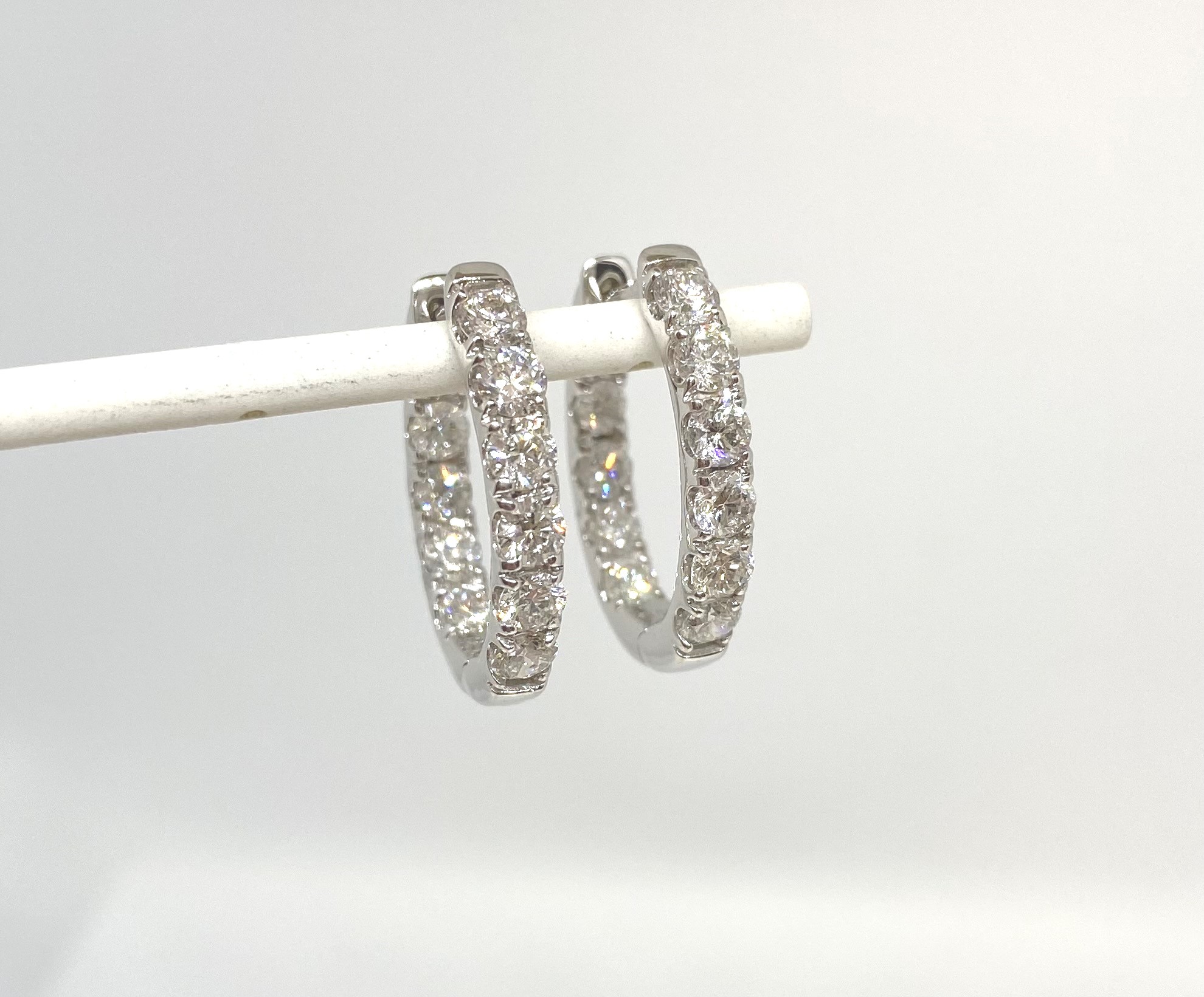 Diamond oval hoop earrings white gold store